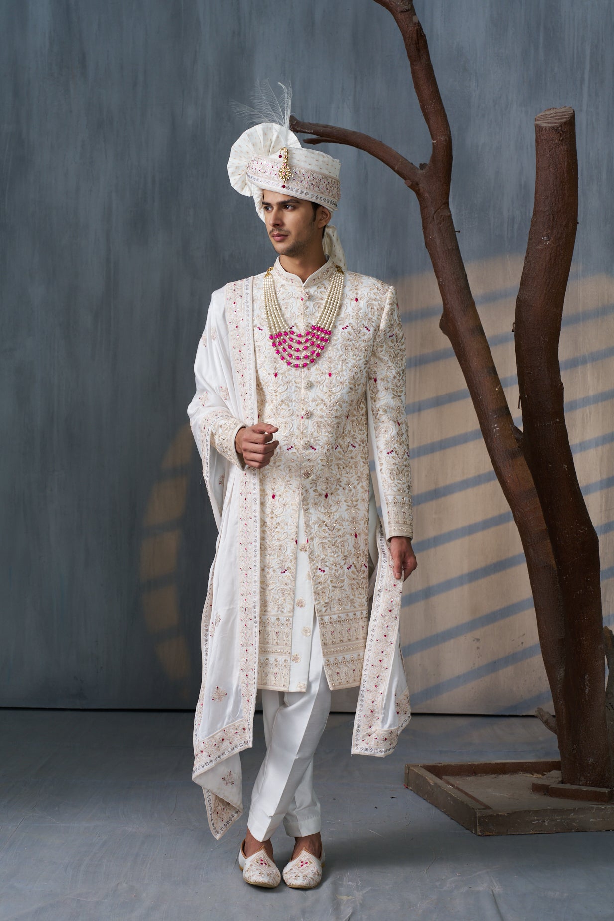 Ivory silk sherwani set with gold embellishments (accessories included
